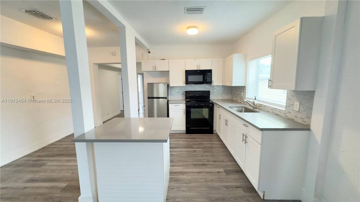 1176 NW 48th St, Miami, FL 33127 (#82577798) | RentalSource